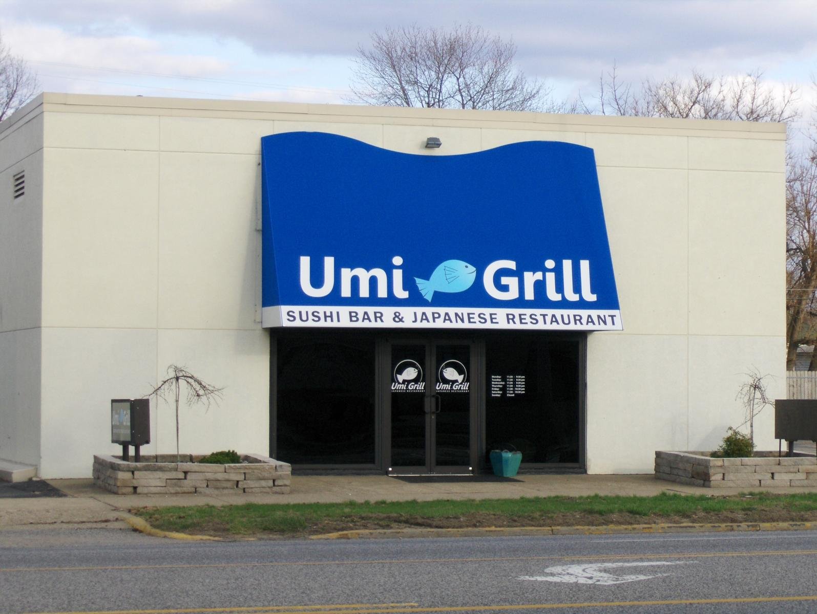Umi Cruved Awning - Member's Gallery - The Sign Syndicate